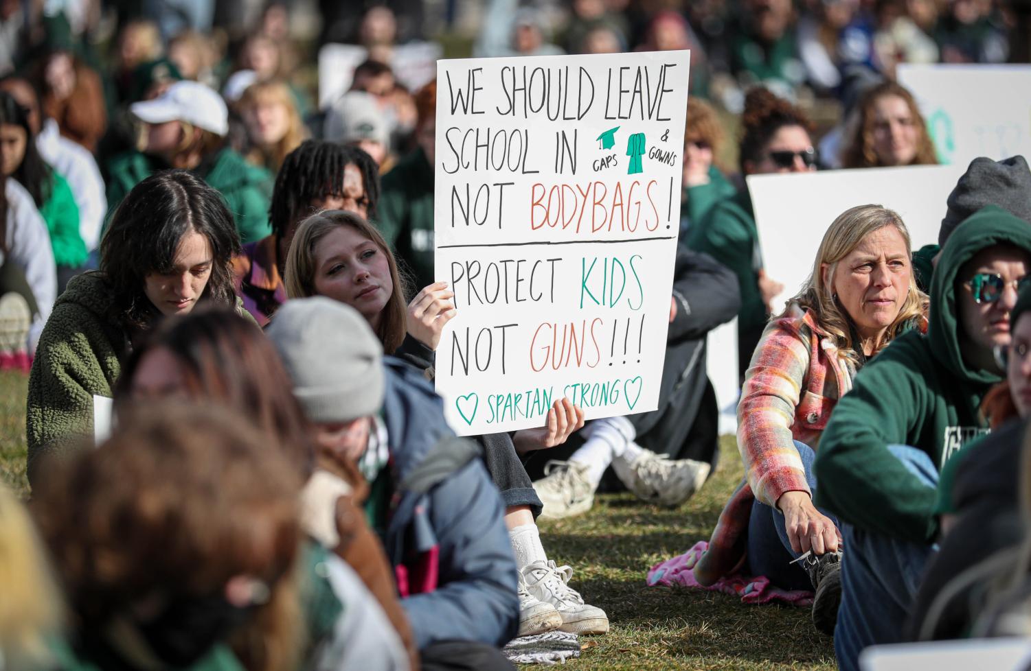 “Spartans cry, Spartans hug one another”: Students gather at Lansing ...